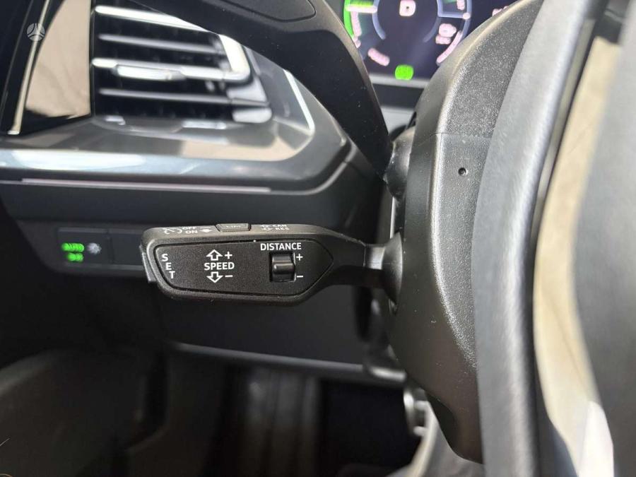 Grey Audi Q4 e-tron 2023 in Vilnius, with an engine capacity of 0.00 L and mileage of 115 thousand km for 29400 €, photo 8 on AUTOMOTO.COM.LV