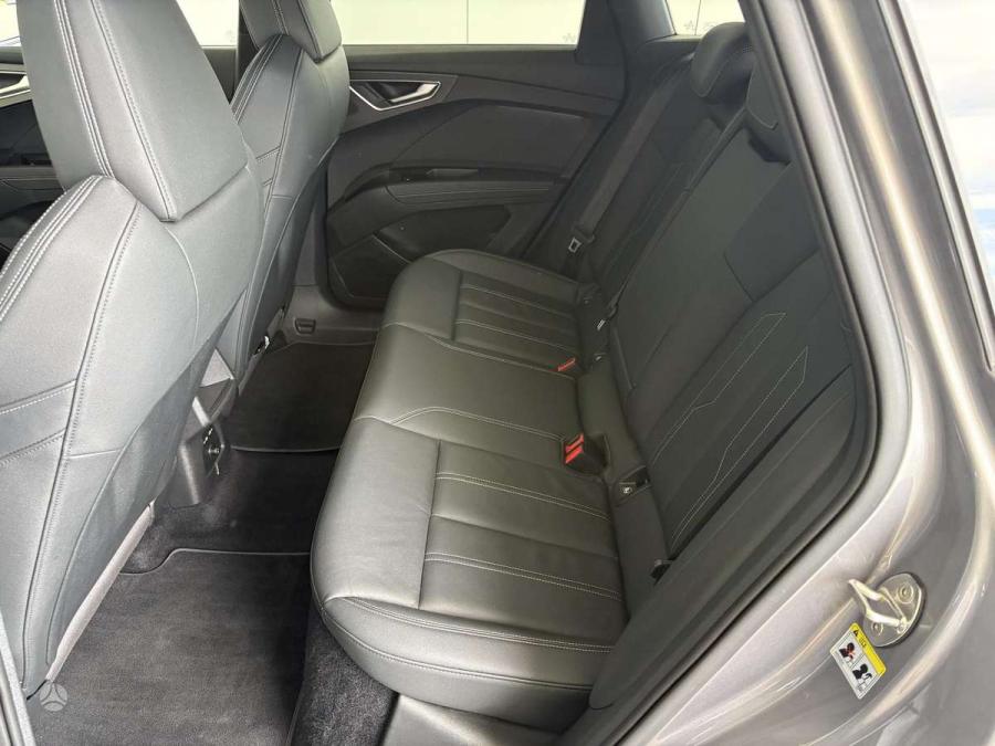 Grey Audi Q4 e-tron 2023 in Vilnius, with an engine capacity of 0.00 L and mileage of 115 thousand km for 29400 €, photo 24 on AUTOMOTO.COM.LV