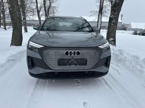 Grey Audi Q4 e-tron 2024 in Kaunas, with an engine capacity of 0.00 L and mileage of 26 thousand km for 31500 €, photo 2 on AUTOMOTO.COM.LV