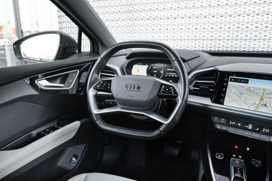 Grey Audi Q4 e-tron 2024 in Marupe, with an engine capacity of 0.00 L and mileage of 48 thousand km for 44900 €, photo 32 on AUTOMOTO.COM.LV