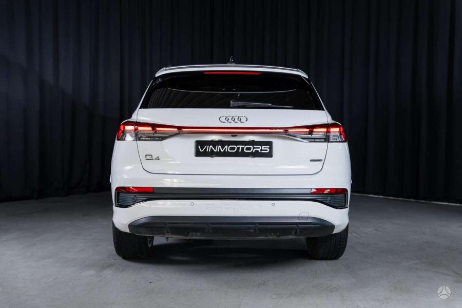 White Audi Q4 e-tron 2024 in Vilnius, with an engine capacity of 0.00 L and mileage of 32 thousand km for 33999 €, photo 6 on AUTOMOTO.COM.LV