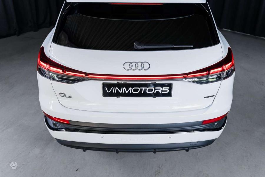 White Audi Q4 e-tron 2024 in Vilnius, with an engine capacity of 0.00 L and mileage of 32 thousand km for 33999 €, photo 11 on AUTOMOTO.COM.LV