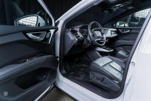 White Audi Q4 e-tron 2024 in Vilnius, with an engine capacity of 0.00 L and mileage of 32 thousand km for 33999 €, photo 13 on AUTOMOTO.COM.LV