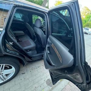 Black Audi Q5 2009 in Riga, with an engine capacity of 2.00 L and mileage of 231 thousand km for 8290 €, photo 9 on AUTOMOTO.COM.LV