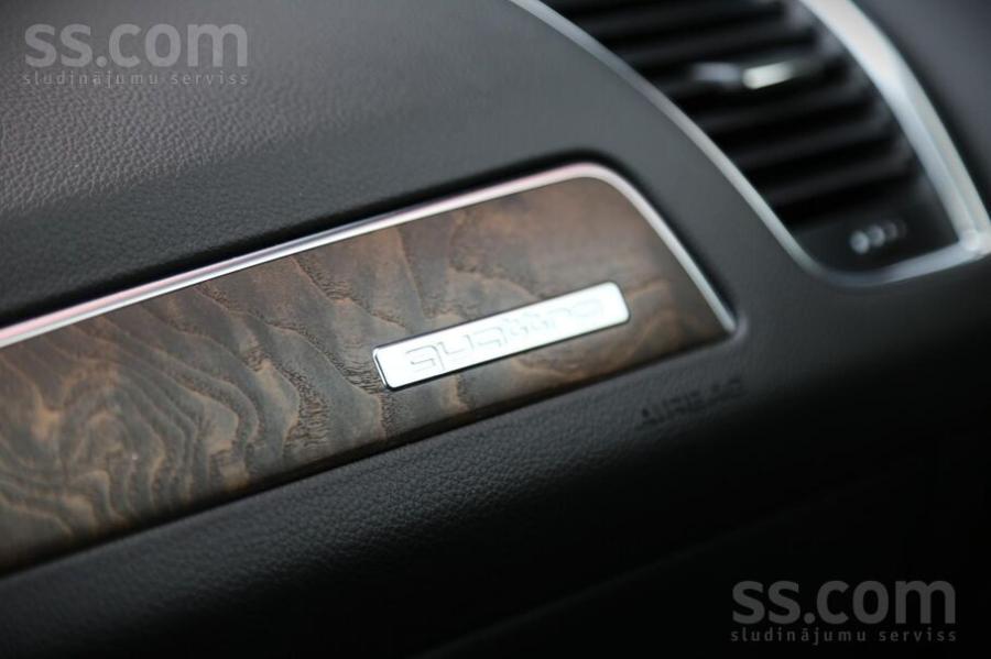 Black Audi Q5 2009 in Riga, with an engine capacity of 2.00 L and mileage of 230 thousand km for 6995 €, photo 18 on AUTOMOTO.COM.LV