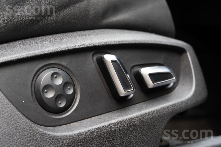 Black Audi Q7 2011 in Riga, with an engine capacity of 3.00 L and mileage of 213 thousand km for 12900 €, photo 13 on AUTOMOTO.COM.LV