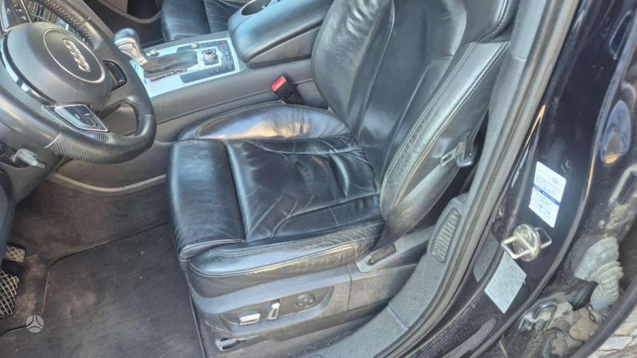 Black Audi Q7 2011 in Rokiskis, with an engine capacity of 4.13 L and mileage of 261 thousand km for 8500 €, photo 15 on AUTOMOTO.COM.LV