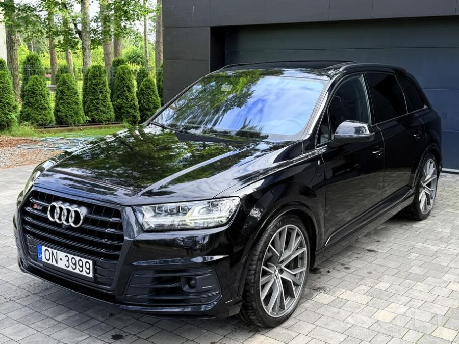 Black Audi Q7 2017 in Riga, with an engine capacity of 4.00 L and mileage of 211 thousand km for 34555 €, photo 1 on AUTOMOTO.COM.LV