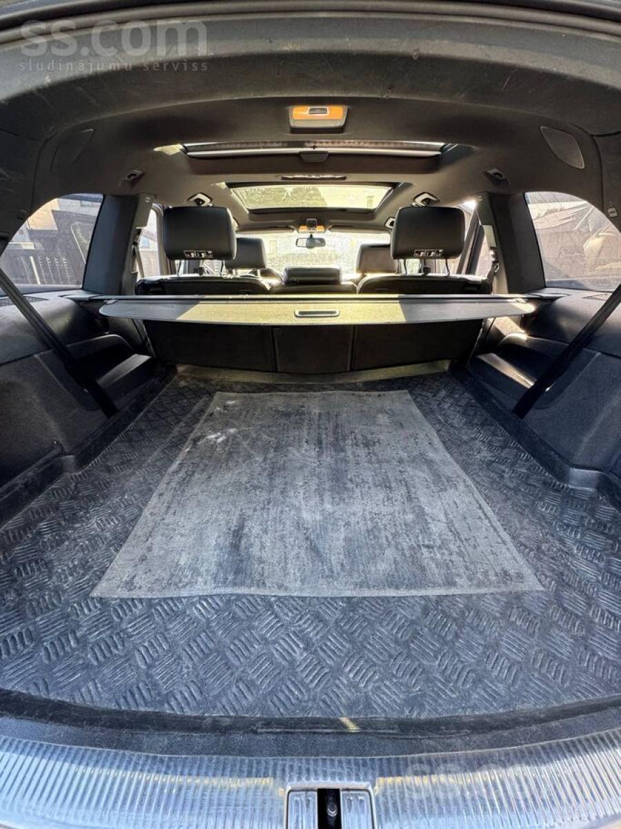 Grey Audi Q7 2011 in Riga, with an engine capacity of 3.00 L and mileage of 276 thousand km for 11990 €, photo 12 on AUTOMOTO.COM.LV