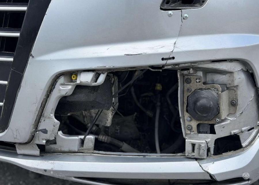 Grey Audi Q7 2016 in Vilnius, with an engine capacity of 2.97 L and mileage of 290 thousand km for 13990 €, photo 17 on AUTOMOTO.COM.LV