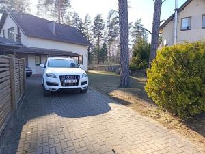 White Audi Q7 2010 in Riga, with an engine capacity of 3.00 L and mileage of 235 thousand km for 10990 €, photo  on AUTOMOTO.COM.LV