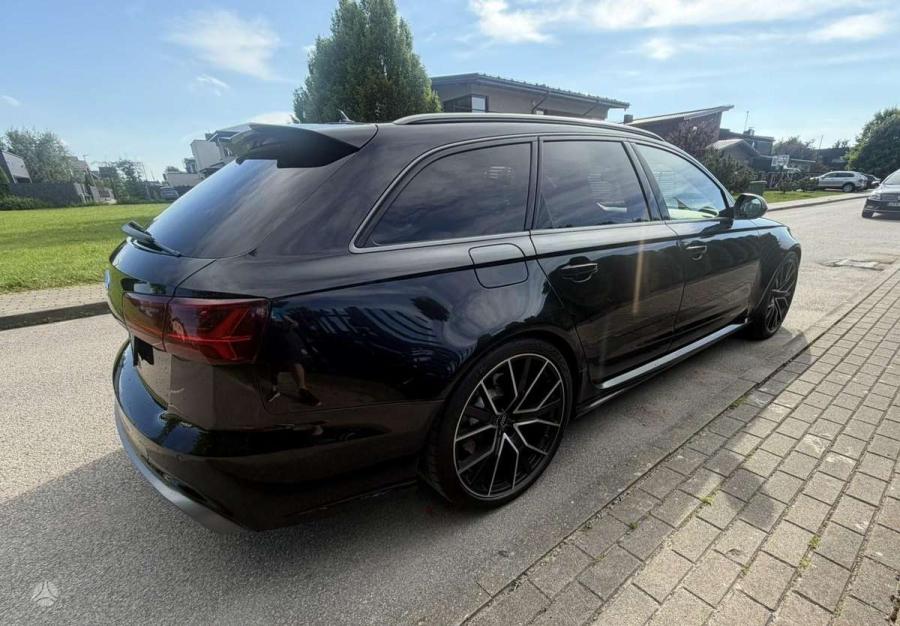 Black Audi RS6 2016 in Kaunas, with an engine capacity of 3.99 L and mileage of 210 thousand km for 42500 €, photo 8 on AUTOMOTO.COM.LV