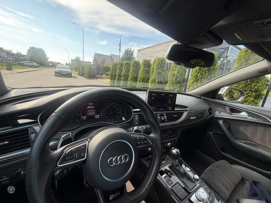 Black Audi RS6 2016 in Kaunas, with an engine capacity of 3.99 L and mileage of 210 thousand km for 42500 €, photo 10 on AUTOMOTO.COM.LV