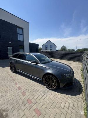 Pelēks Audi RS6 2014 Viļņa, ar dzinēja tilpumu 3.99 L un nobraukumu 220 tūkst. km par 39000 €, foto  vietnē AUTOMOTO.COM.LV