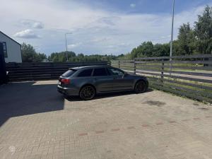 Grey Audi RS6 2014 in Vilnius, with an engine capacity of 3.99 L and mileage of 220 thousand km for 39000 €, photo 4 on AUTOMOTO.COM.LV
