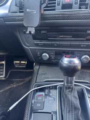 Grey Audi RS6 2014 in Vilnius, with an engine capacity of 3.99 L and mileage of 220 thousand km for 39000 €, photo 9 on AUTOMOTO.COM.LV