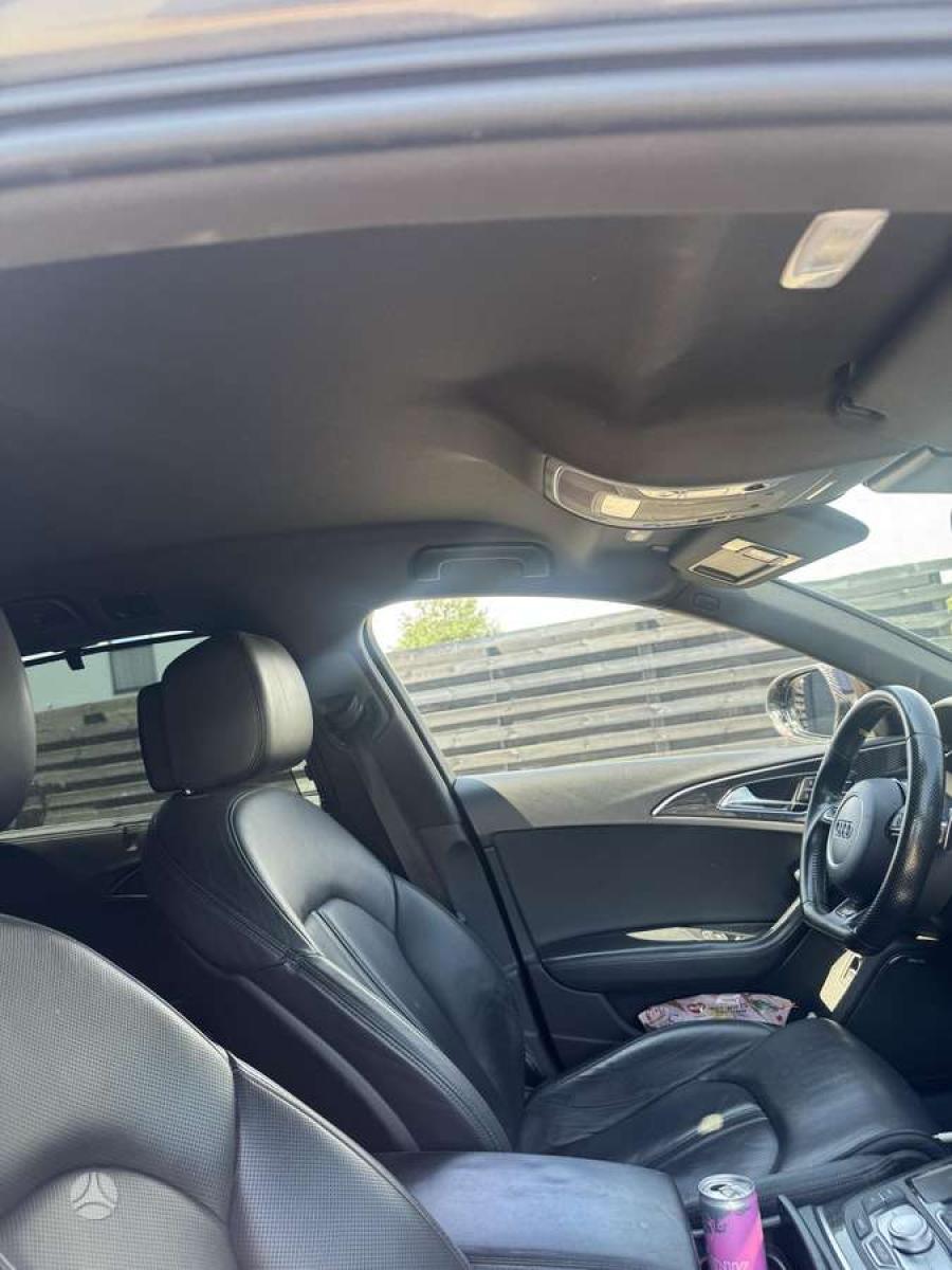 Grey Audi RS6 2014 in Vilnius, with an engine capacity of 3.99 L and mileage of 220 thousand km for 39000 €, photo 10 on AUTOMOTO.COM.LV