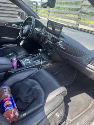 Grey Audi RS6 2014 in Vilnius, with an engine capacity of 3.99 L and mileage of 220 thousand km for 39000 €, photo 12 on AUTOMOTO.COM.LV