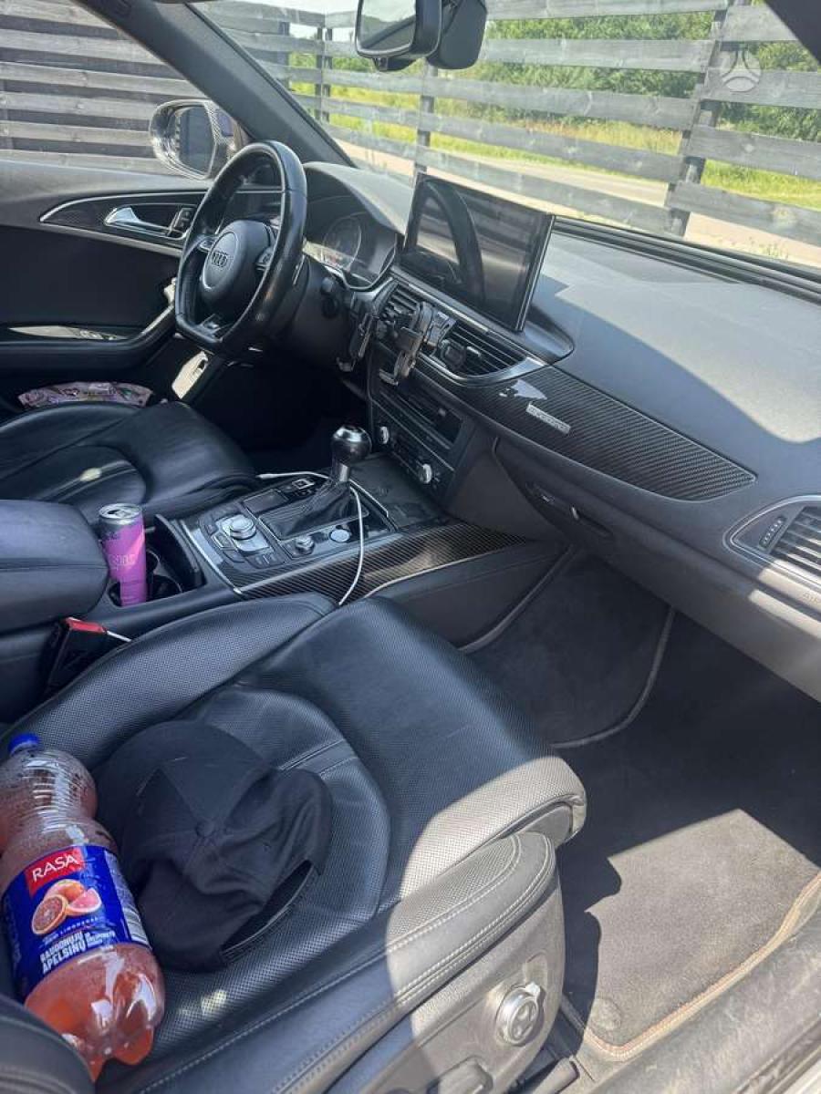 Grey Audi RS6 2014 in Vilnius, with an engine capacity of 3.99 L and mileage of 220 thousand km for 39000 €, photo 12 on AUTOMOTO.COM.LV