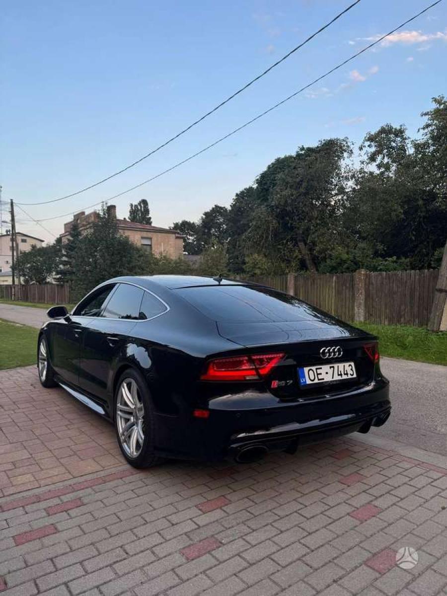 Black Audi RS7 2014 in Riga, with an engine capacity of 3.99 L and mileage of 160 thousand km for 29800 €, photo 2 on AUTOMOTO.COM.LV