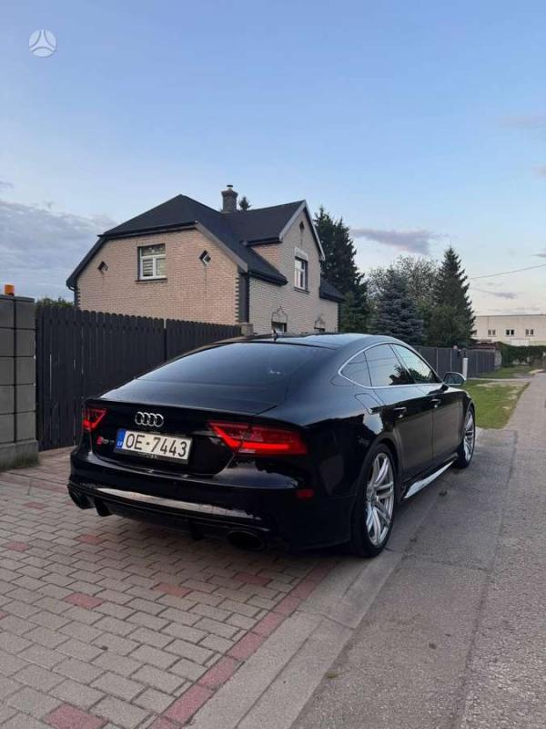 Melns Audi RS7 2014 Rīga, ar dzinēja tilpumu 3.99 L un nobraukumu 160 tūkst. km par 29800 €, foto 3 vietnē AUTOMOTO.COM.LV