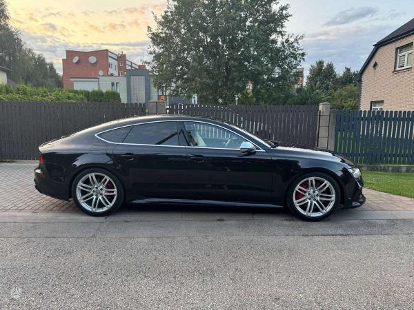 Melns Audi RS7 2014 Rīga, ar dzinēja tilpumu 3.99 L un nobraukumu 160 tūkst. km par 29800 €, foto 4 vietnē AUTOMOTO.COM.LV