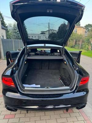 Black Audi RS7 2014 in Riga, with an engine capacity of 3.99 L and mileage of 160 thousand km for 29800 €, photo 18 on AUTOMOTO.COM.LV