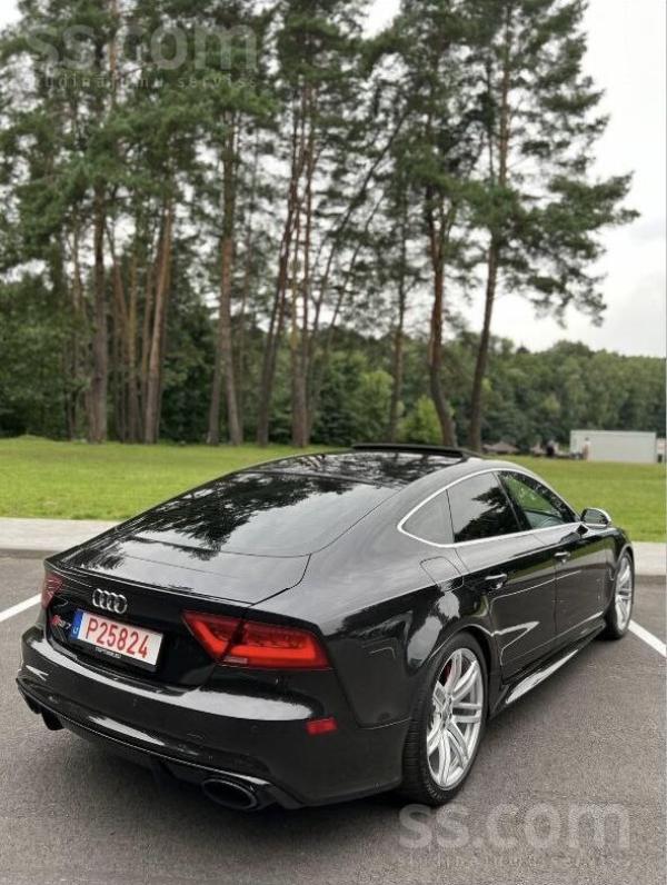 Violet Audi RS7 2014 in Riga, with an engine capacity of 4.00 L and mileage of 160 thousand km for 24499 €, photo 2 on AUTOMOTO.COM.LV