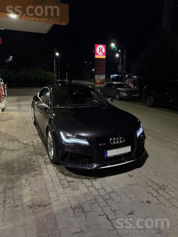 Violet Audi RS7 2014 in Riga, with an engine capacity of 4.00 L and mileage of 160 thousand km for 24499 €, photo 4 on AUTOMOTO.COM.LV