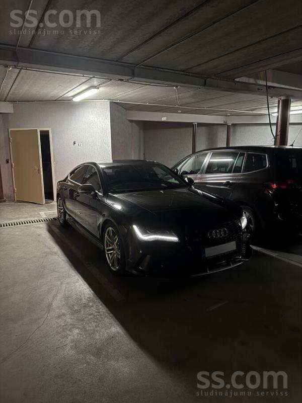 Violet Audi RS7 2014 in Riga, with an engine capacity of 4.00 L and mileage of 160 thousand km for 24499 €, photo 7 on AUTOMOTO.COM.LV