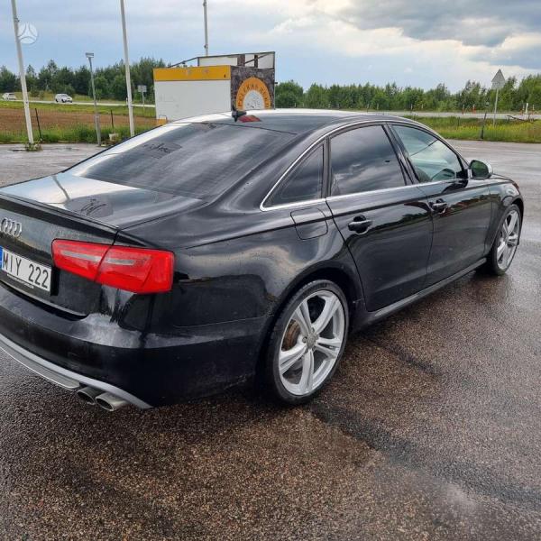 Black Audi S6 2013 in Vilnius, with an engine capacity of 3.99 L and mileage of 185 thousand km for 16500 €, photo 4 on AUTOMOTO.COM.LV
