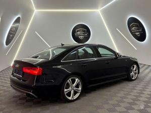 Black Audi S6 2013 in Marijampole, with an engine capacity of 3.99 L and mileage of 200 thousand km for 17500 €, photo 15 on AUTOMOTO.COM.LV