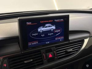 Black Audi S6 2013 in Marijampole, with an engine capacity of 3.99 L and mileage of 200 thousand km for 17500 €, photo 18 on AUTOMOTO.COM.LV