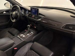 Black Audi S6 2013 in Marijampole, with an engine capacity of 3.99 L and mileage of 200 thousand km for 17500 €, photo 19 on AUTOMOTO.COM.LV