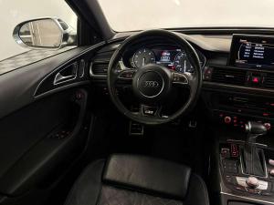 Black Audi S6 2013 in Marijampole, with an engine capacity of 3.99 L and mileage of 200 thousand km for 17500 €, photo 20 on AUTOMOTO.COM.LV