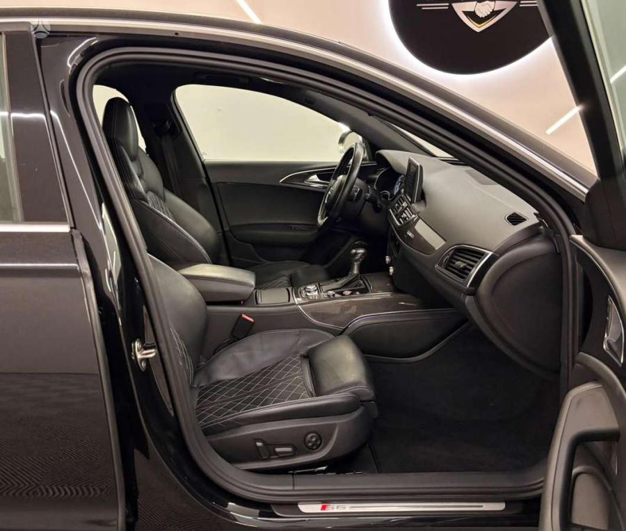 Black Audi S6 2013 in Marijampole, with an engine capacity of 3.99 L and mileage of 200 thousand km for 17500 €, photo 24 on AUTOMOTO.COM.LV