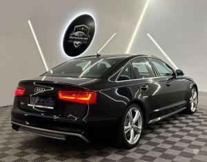 Black Audi S6 2013 in Marijampole, with an engine capacity of 3.99 L and mileage of 200 thousand km for 17500 €, photo 35 on AUTOMOTO.COM.LV