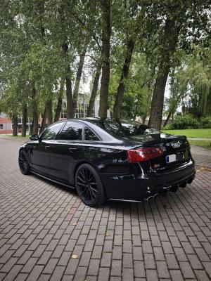 Black Audi S6 2013 in Klaipeda, with an engine capacity of 3.99 L and mileage of 167 thousand km for 23500 €, photo 4 on AUTOMOTO.COM.LV