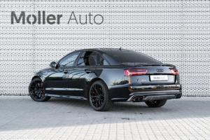 Black Audi S6 2016 in Riga, with an engine capacity of 4.00 L and mileage of 141 thousand km for 33850 €, photo 3 on AUTOMOTO.COM.LV