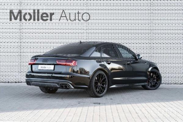 Black Audi S6 2016 in Riga, with an engine capacity of 4.00 L and mileage of 141 thousand km for 33850 €, photo 4 on AUTOMOTO.COM.LV