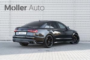 Black Audi S6 2016 in Riga, with an engine capacity of 4.00 L and mileage of 141 thousand km for 33850 €, photo 4 on AUTOMOTO.COM.LV