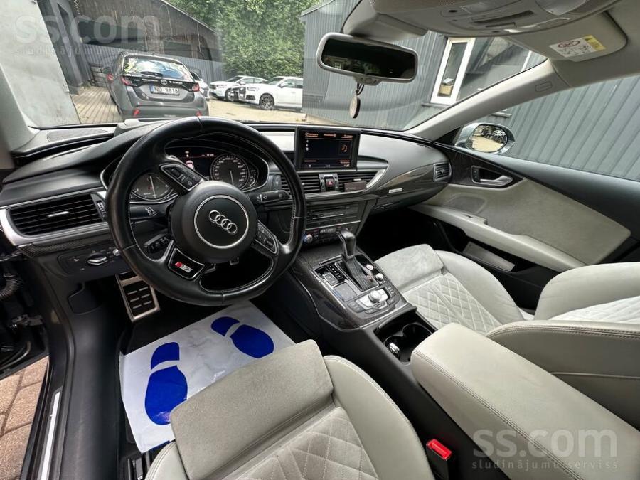 Grey Audi S7 2014 in Riga, with an engine capacity of 4.00 L and mileage of 244 thousand km for 27999 €, photo 7 on AUTOMOTO.COM.LV