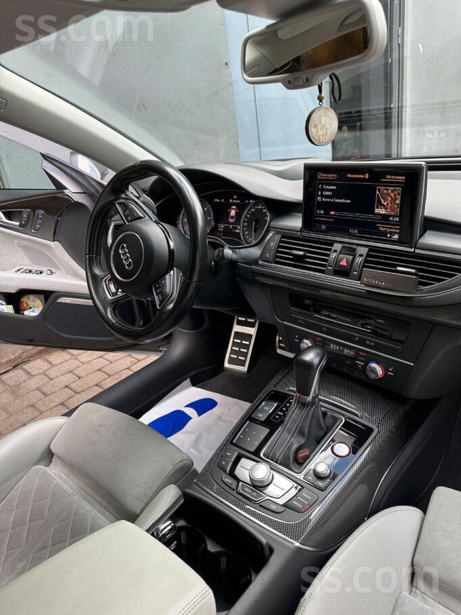 Grey Audi S7 2014 in Riga, with an engine capacity of 4.00 L and mileage of 244 thousand km for 27999 €, photo 8 on AUTOMOTO.COM.LV