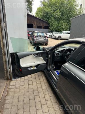 Grey Audi S7 2014 in Riga, with an engine capacity of 4.00 L and mileage of 244 thousand km for 27999 €, photo 10 on AUTOMOTO.COM.LV