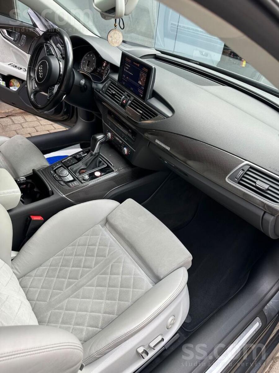 Grey Audi S7 2014 in Riga, with an engine capacity of 4.00 L and mileage of 244 thousand km for 27999 €, photo 11 on AUTOMOTO.COM.LV