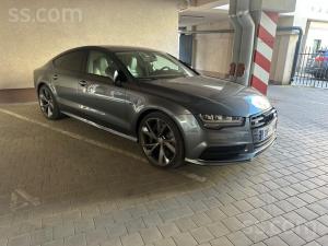 Grey Audi S7 2014 in Riga, with an engine capacity of 4.00 L and mileage of 244 thousand km for 27999 €, photo 13 on AUTOMOTO.COM.LV
