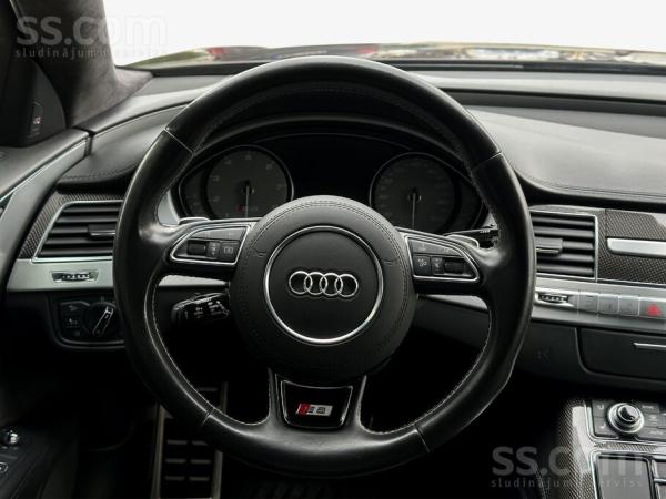 Audi S8 2012 in Riga on AUTOMOTO.COM.LV Black Audi S8 2012 in Riga, with an engine capacity of 4.00 L and mileage of 137 thousand km for 25990 €, photo 9 on AUTOMOTO.COM.LV
