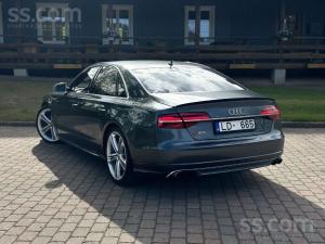 Grey Audi S8 2014 in Riga, with an engine capacity of 4.00 L and mileage of 249 thousand km for 26500 €, photo 7 on AUTOMOTO.COM.LV