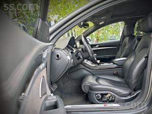 Grey Audi S8 2016 in Riga, with an engine capacity of 4.00 L and mileage of 120 thousand km for 45555 €, photo 14 on AUTOMOTO.COM.LV