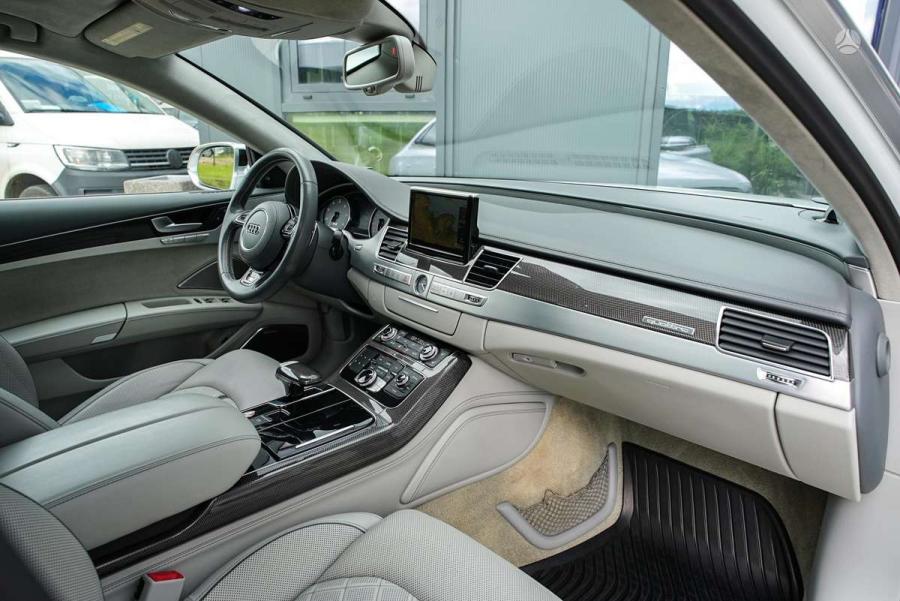White Audi S8 2013 in Kaunas, with an engine capacity of 3.99 L and mileage of 198 thousand km for 23750 €, photo 49 on AUTOMOTO.COM.LV